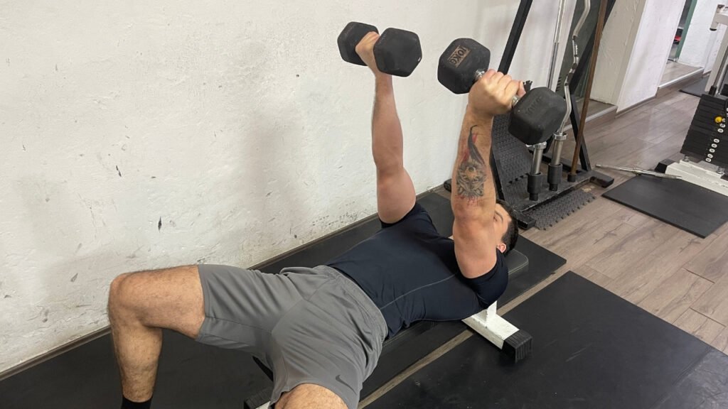 How to Do a Dumbbell Tricep Press: Muscles Worked, Benefits, and ...
